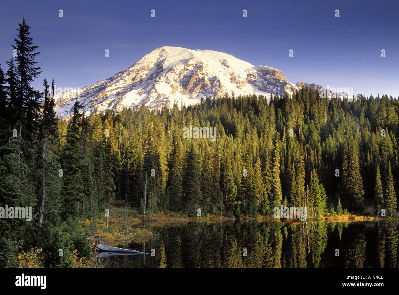 Mount Rainier reflected on Reflection Lake at sunrise Reflection Lakes ...