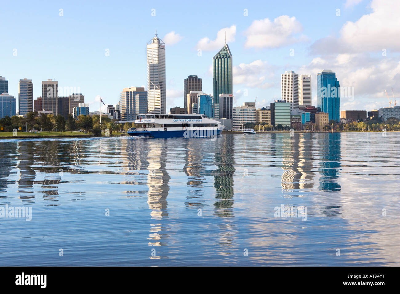 A 'Captain Cook Cruises' ferry on the Swan River with Perth's ...
