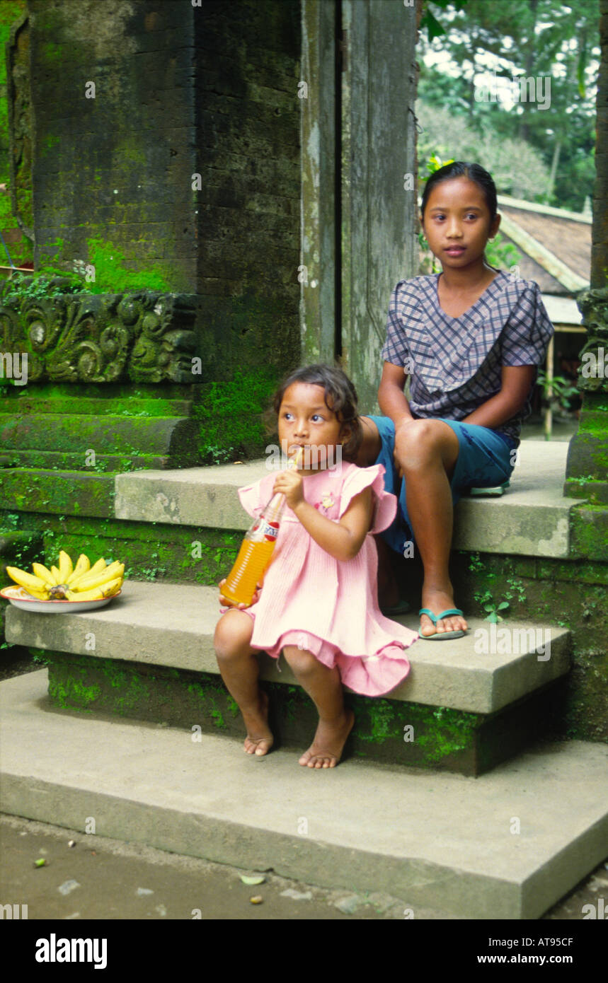 Children at door of Balinese temple Ubud Stock Photo - Alamy