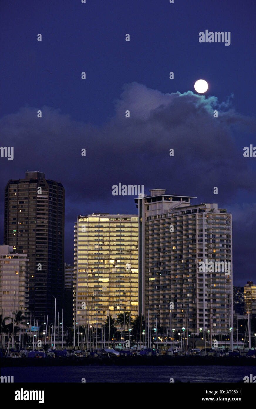 Honolulu high rise buildings with full moon overhead Stock Photo - Alamy