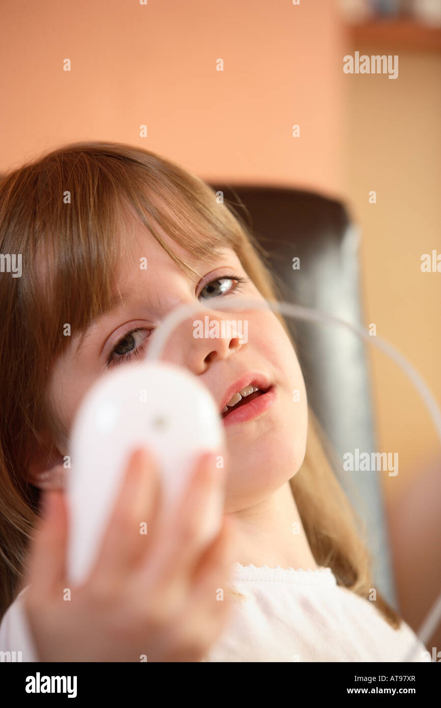 Child holding computer mouse Stock Photo - Alamy