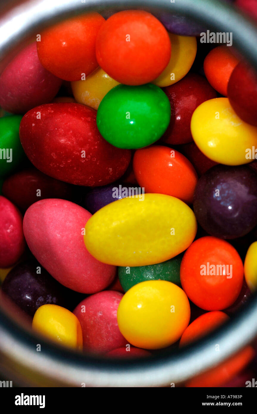 A Glass Jar Filled With Multi Coloured Sweets/Candy Stock Photo - Alamy