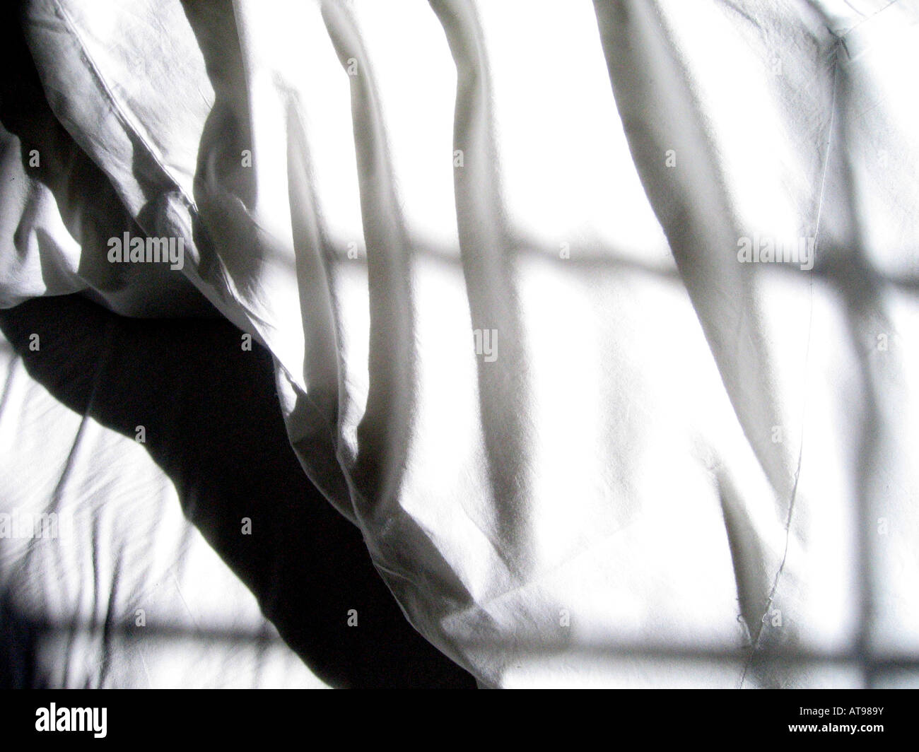 Shadows on wrinkled bed sheet Stock Photo - Alamy