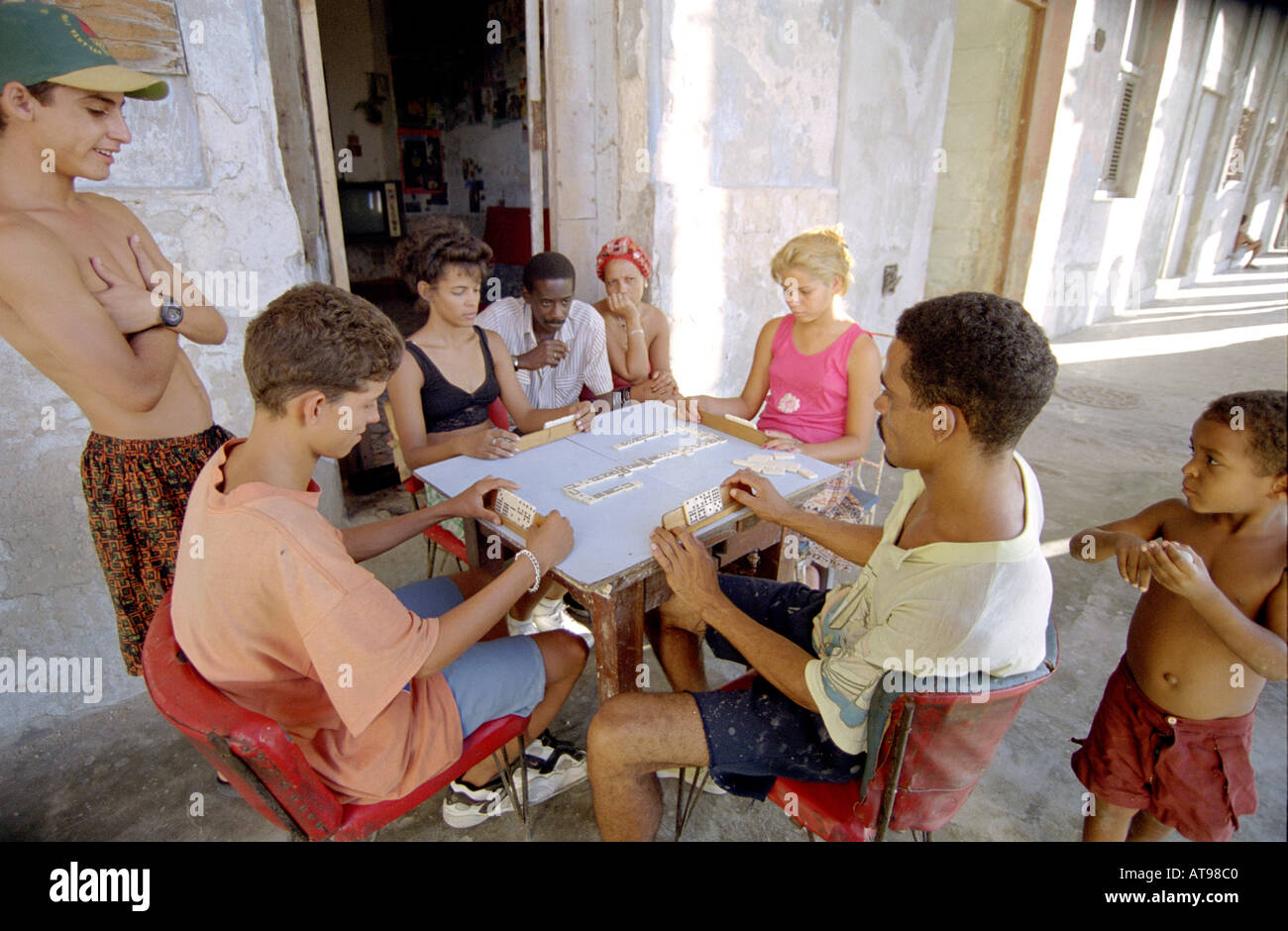 Cubans playing dominos outside their house in Havana Cuba Stock Photo ...