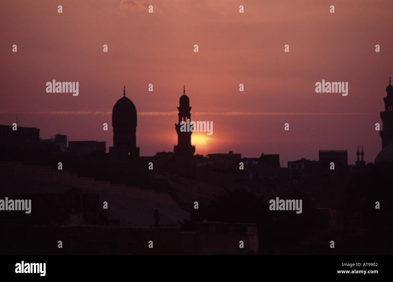 Sunset over the citadel with the minaret s of the sultan hassan and ...
