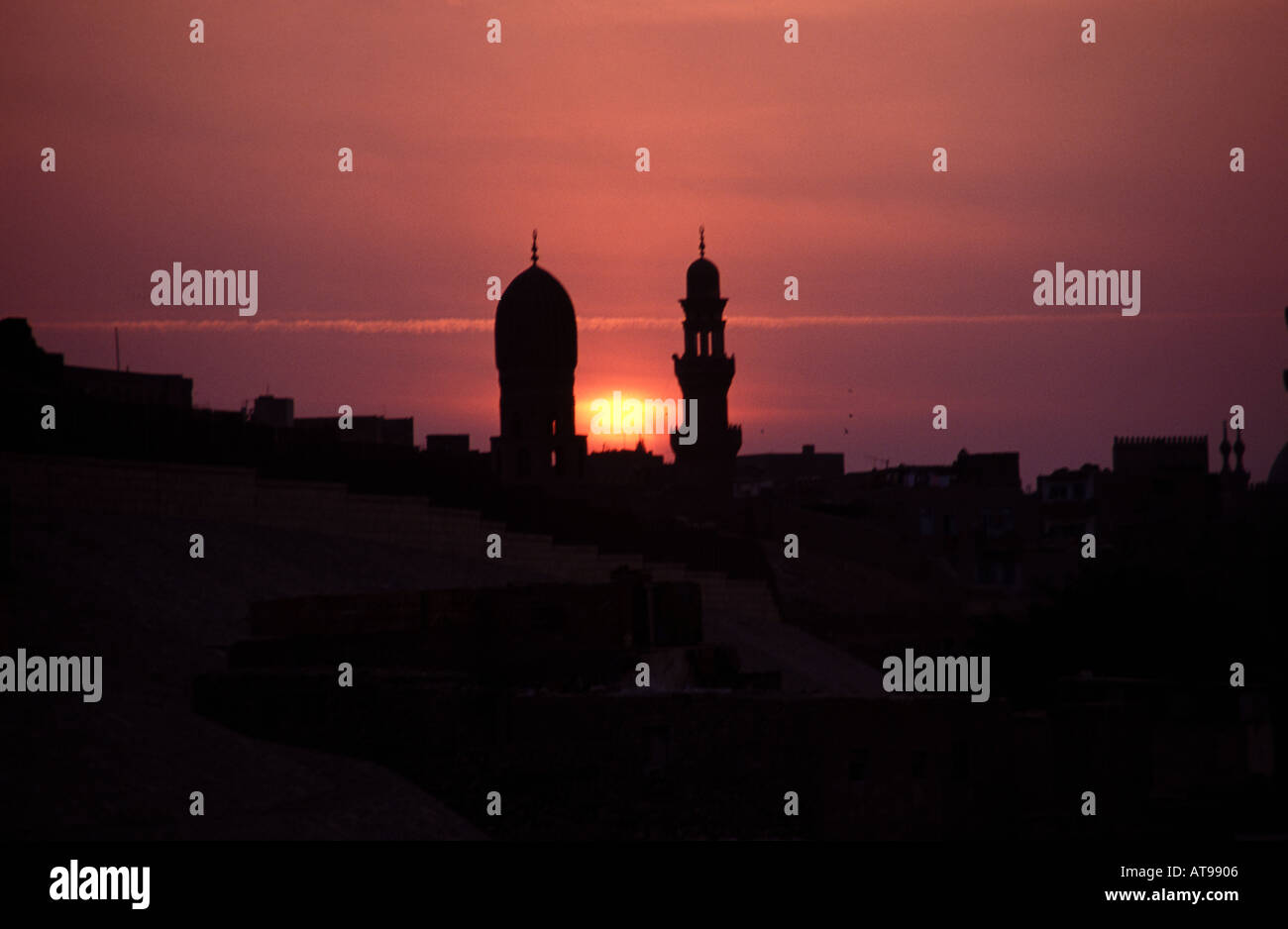 Sunset over the citadel with the minaret s of the sultan hassan and ...