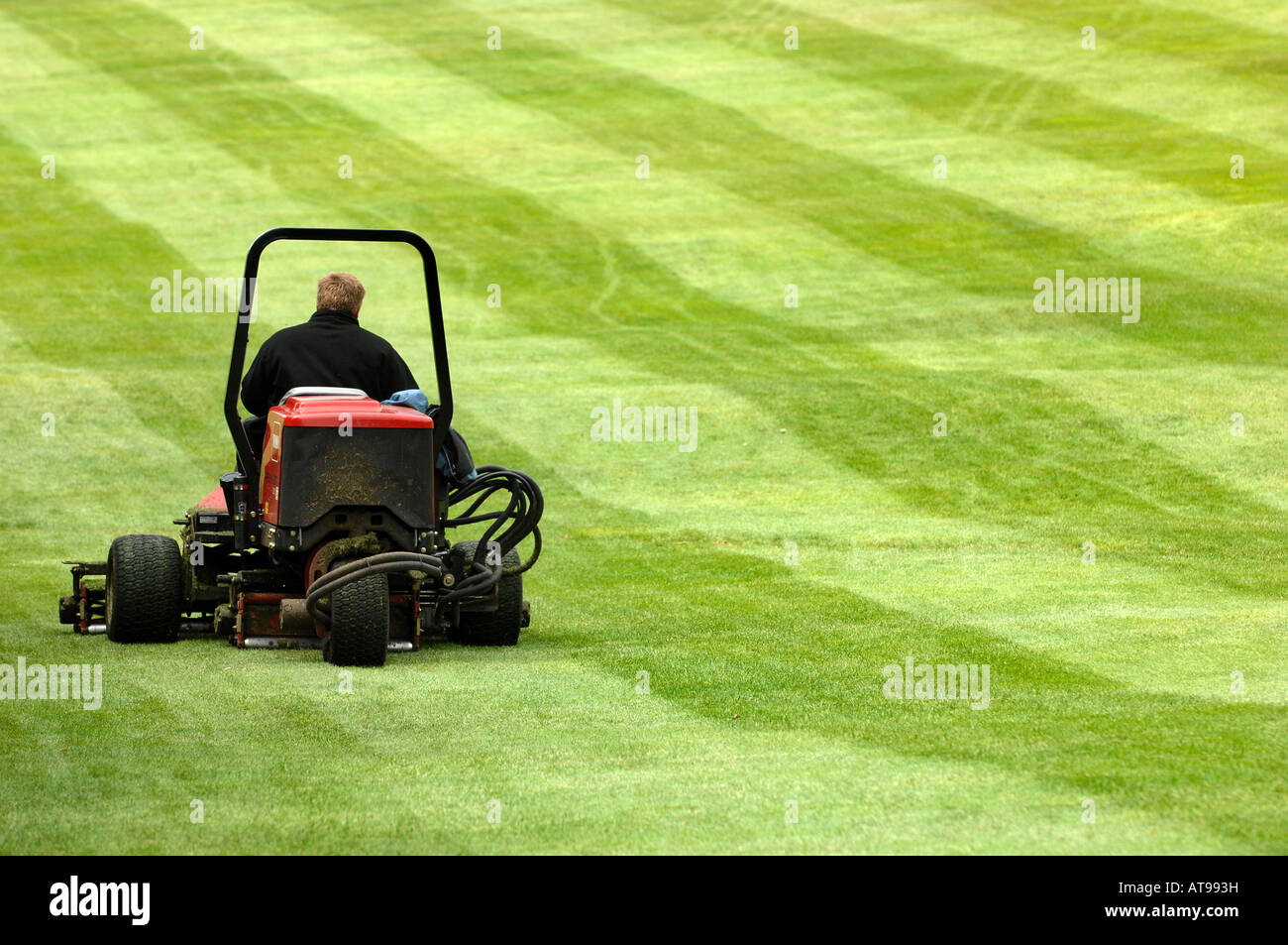 Grass cutting tractor hi-res stock photography and images - Alamy