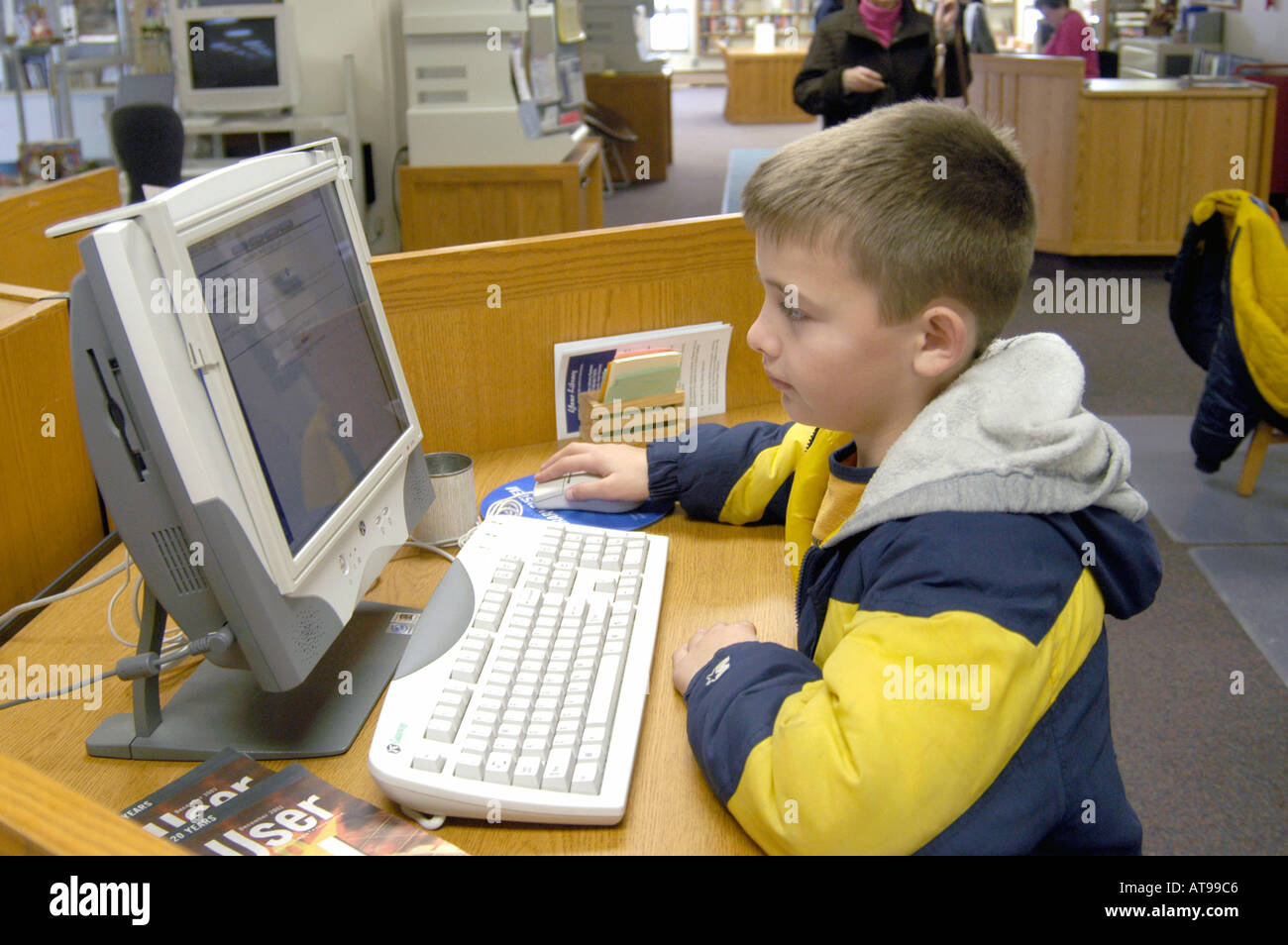 9 Year Old Boy Learns to use Card Catalogue System at Public Library on ...