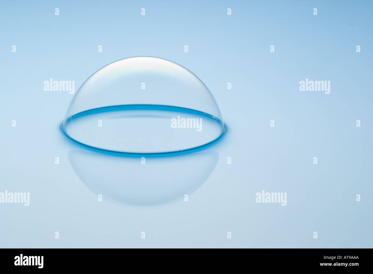 soap bubble floating swimming on water surface studio Stock Photo - Alamy