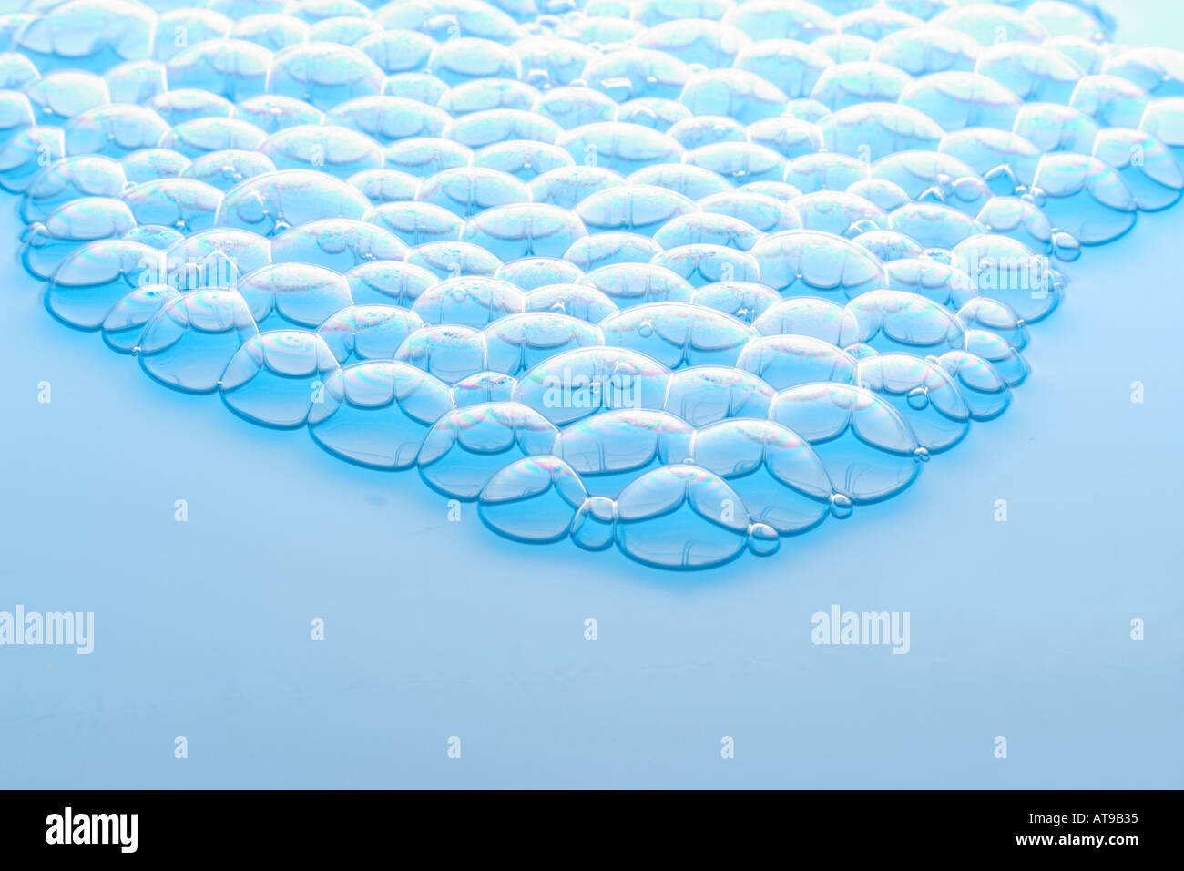 soap bubbles swimming floating on water surface studio Stock Photo - Alamy