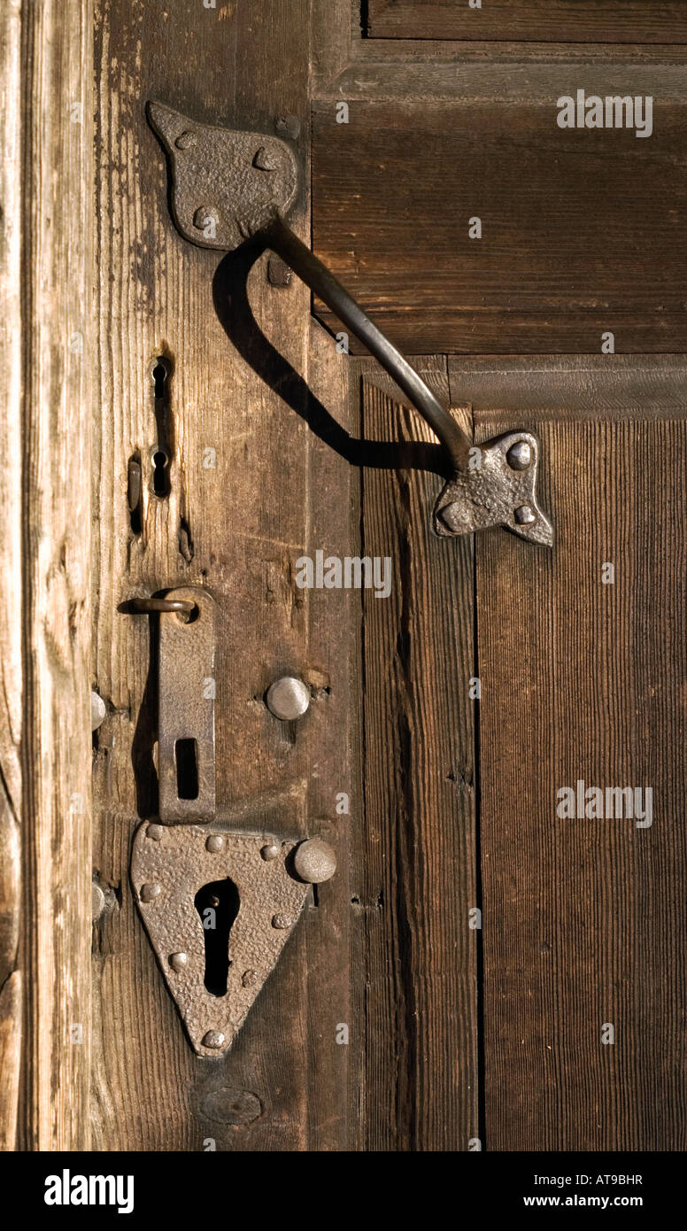 Iron lock and handle on old door Stock Photo - Alamy