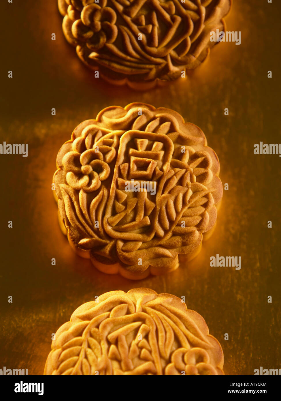 close up of moon cakes with golden background Stock Photo - Alamy