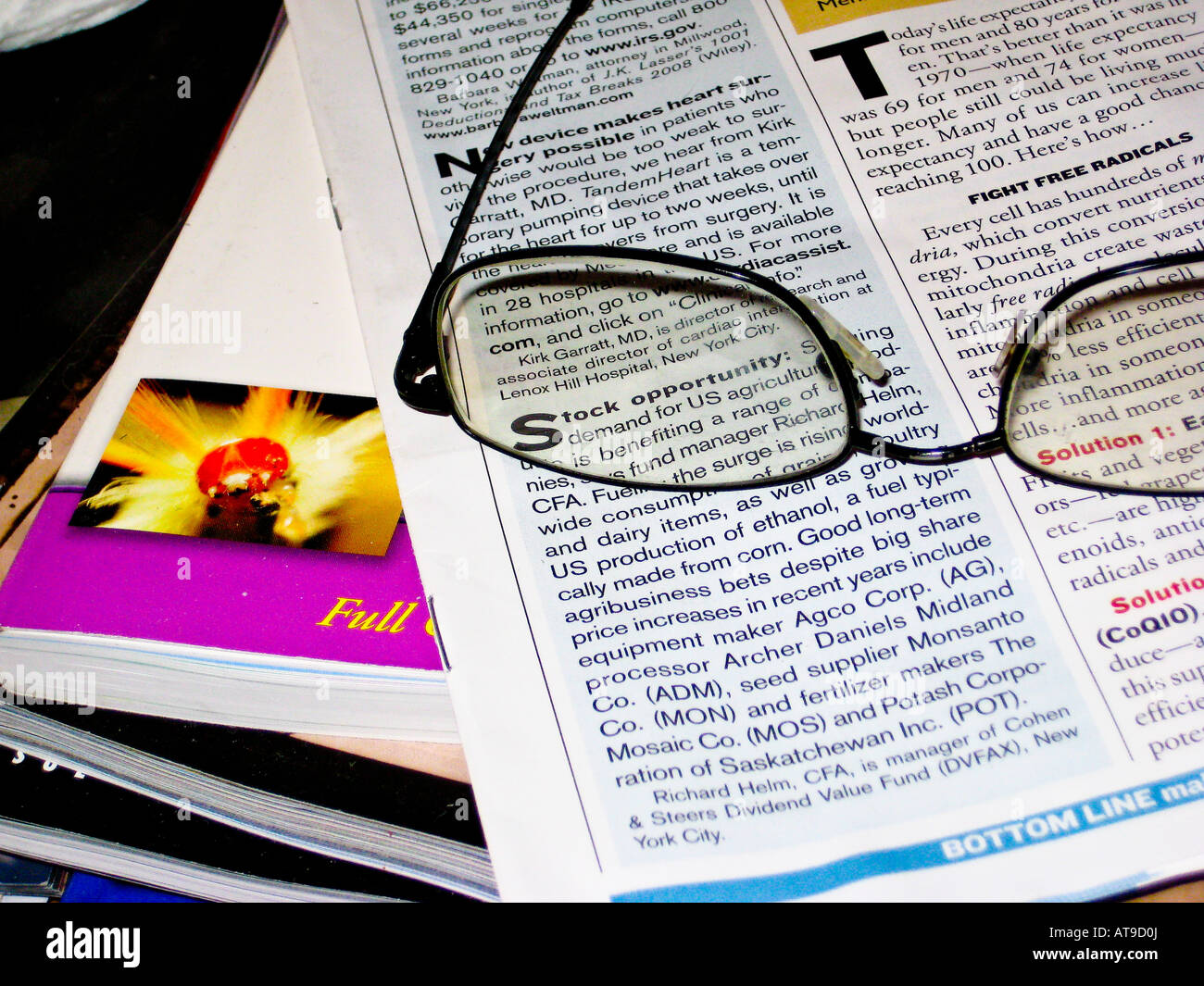 Eyeglasses on Investment Paper Stock Photo - Alamy