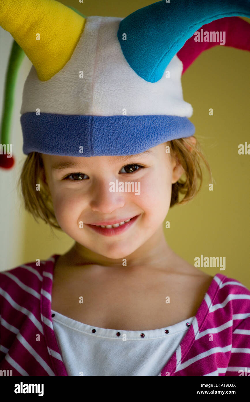 Young girl with clown hat Stock Photo - Alamy