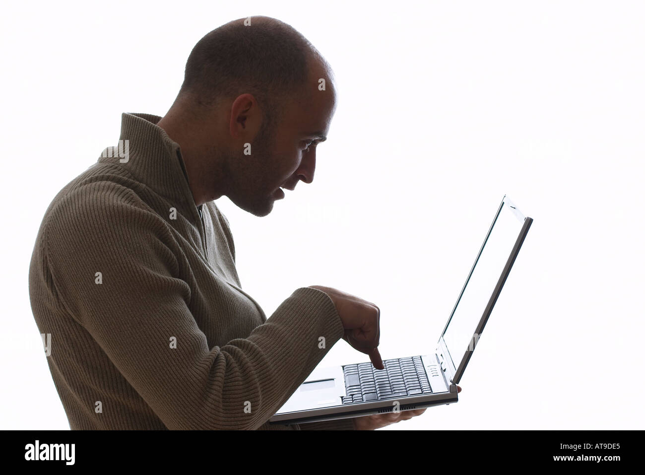 man typing on his notebook Stock Photo - Alamy