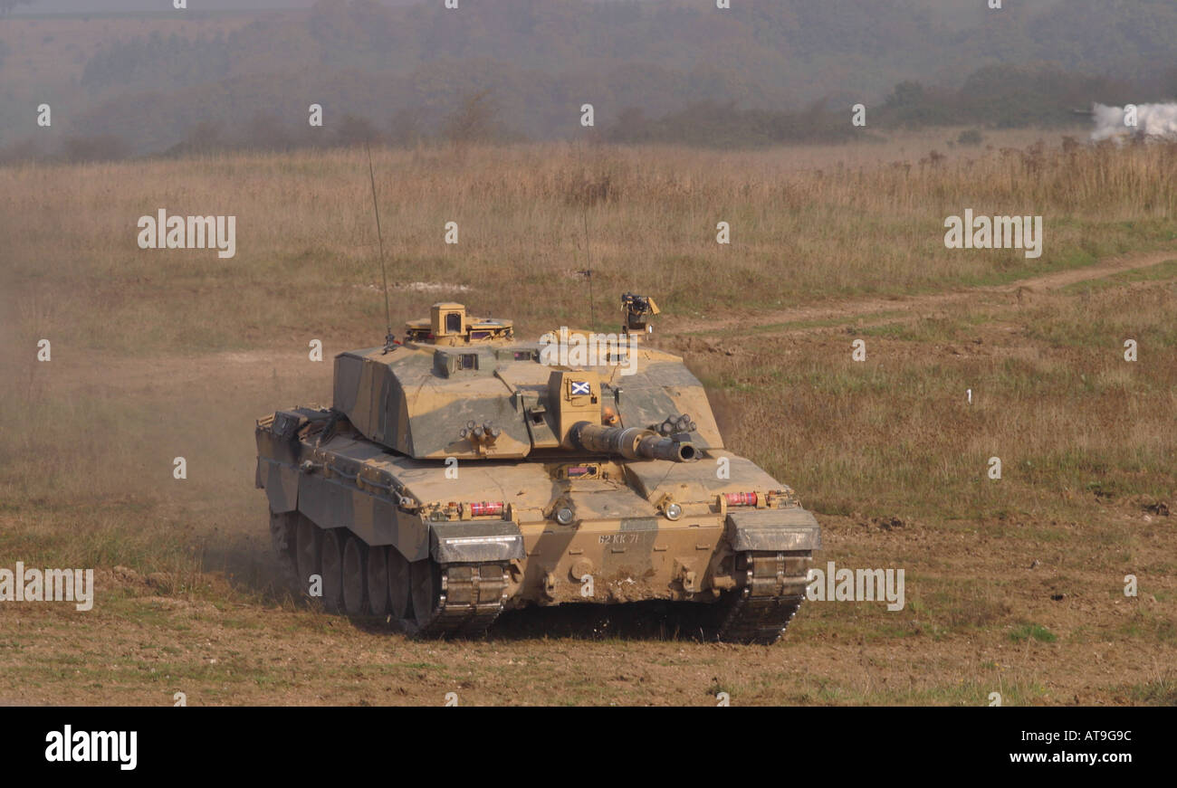 British Army Challenger 2 main battle tank driving at speed across ...