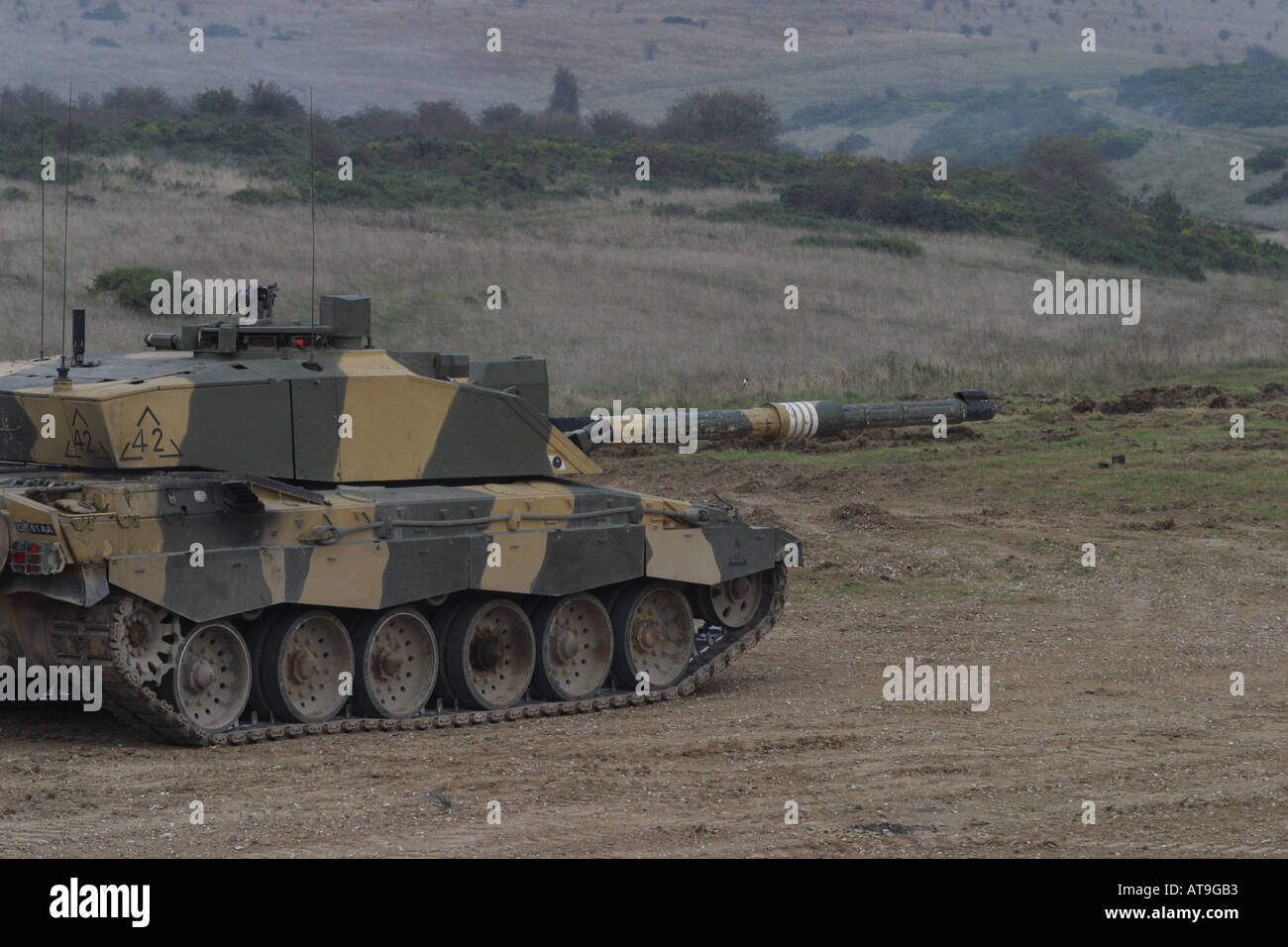 British Army Challenger 2 main battle tank preparing to fire its 120 mm ...