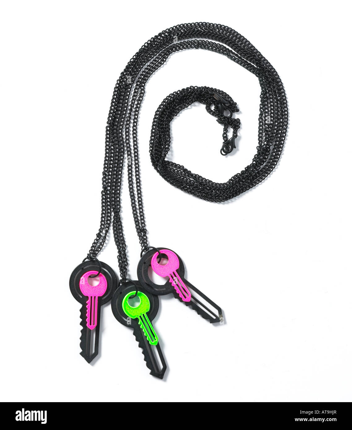 keys on a chain styled in a compact curl Stock Photo - Alamy