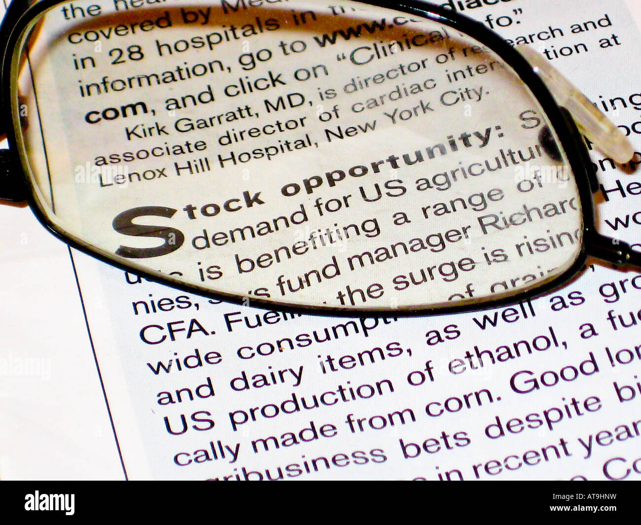 Glasses On Magazine Text Stock Photo - Alamy