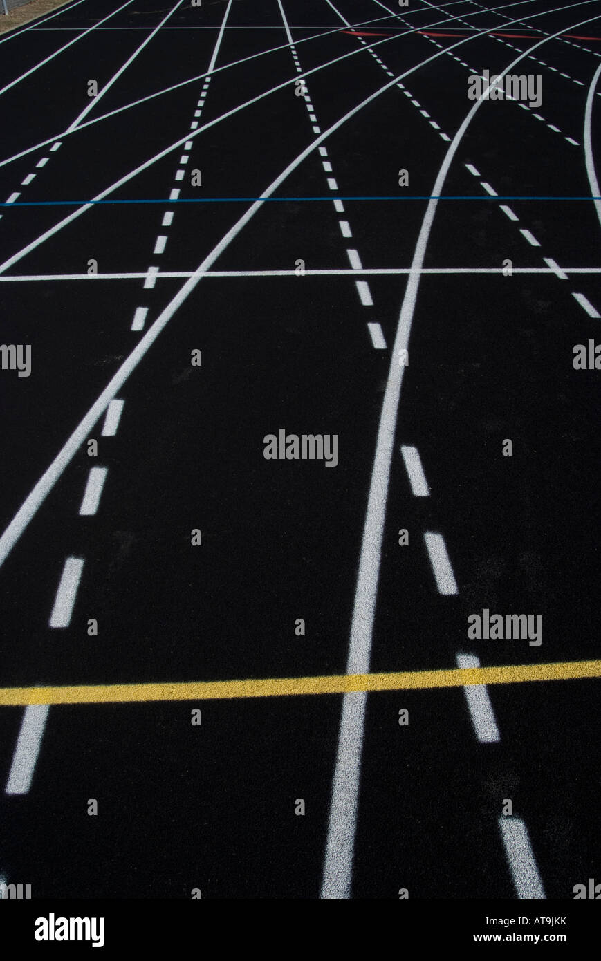 Lane markings on the black surface of an athletic running track Stock ...