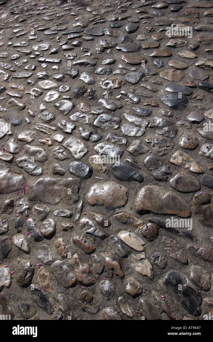 Pattern formed by cobbles on road Stock Photo - Alamy