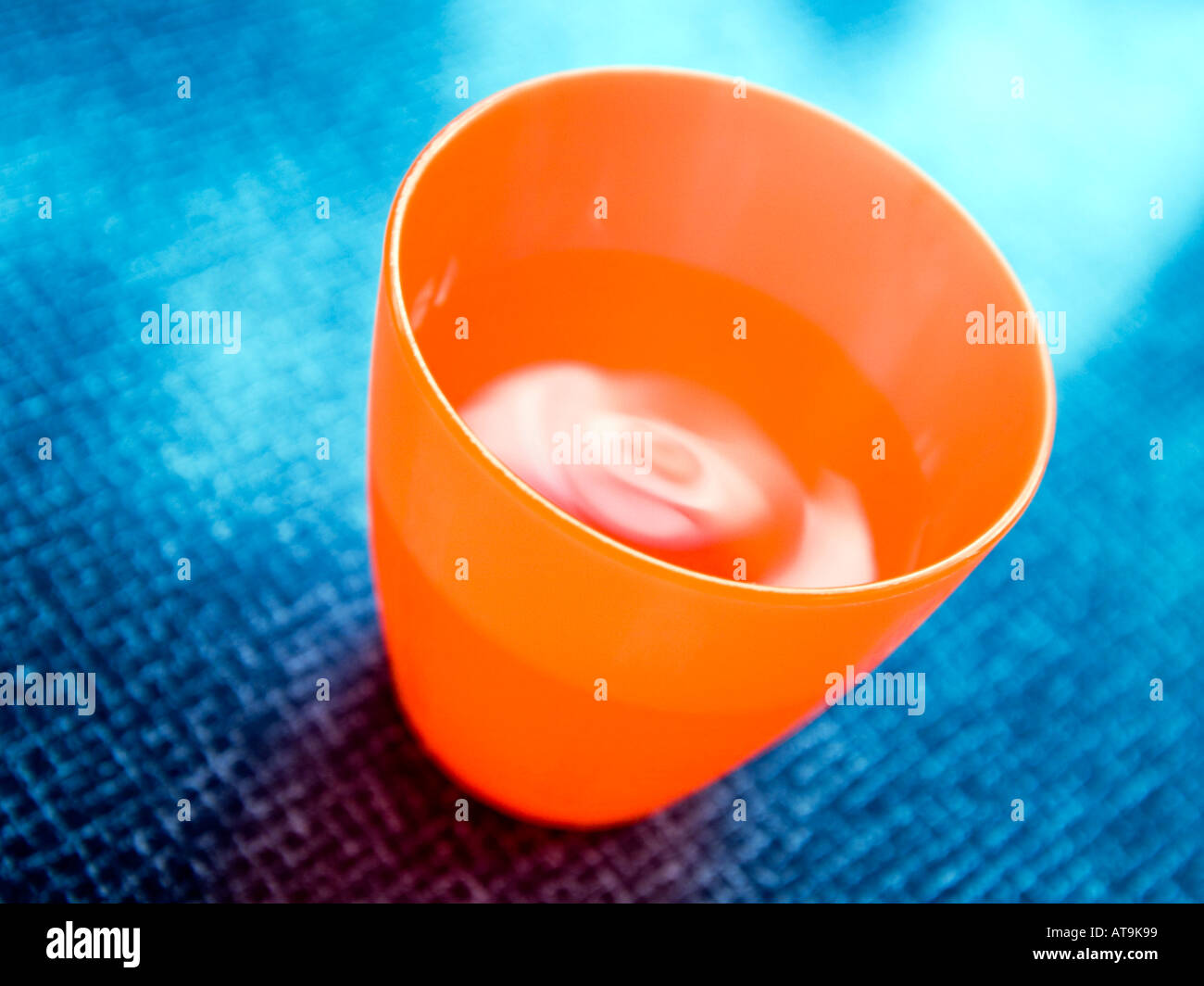 Plastic cup with water Stock Photo - Alamy
