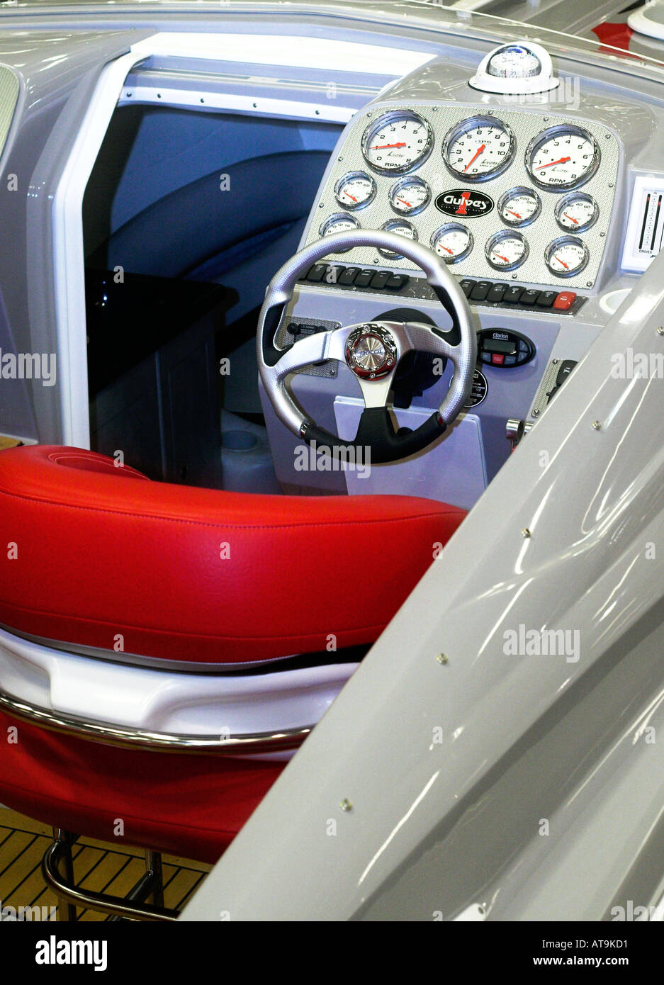 dashboard wheel and gauges on racing boat Stock Photo - Alamy