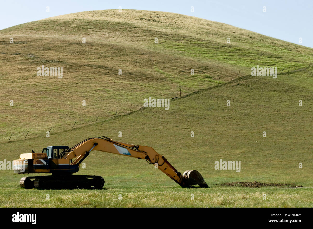 Heavy Equipment and Hill Stock Photo - Alamy