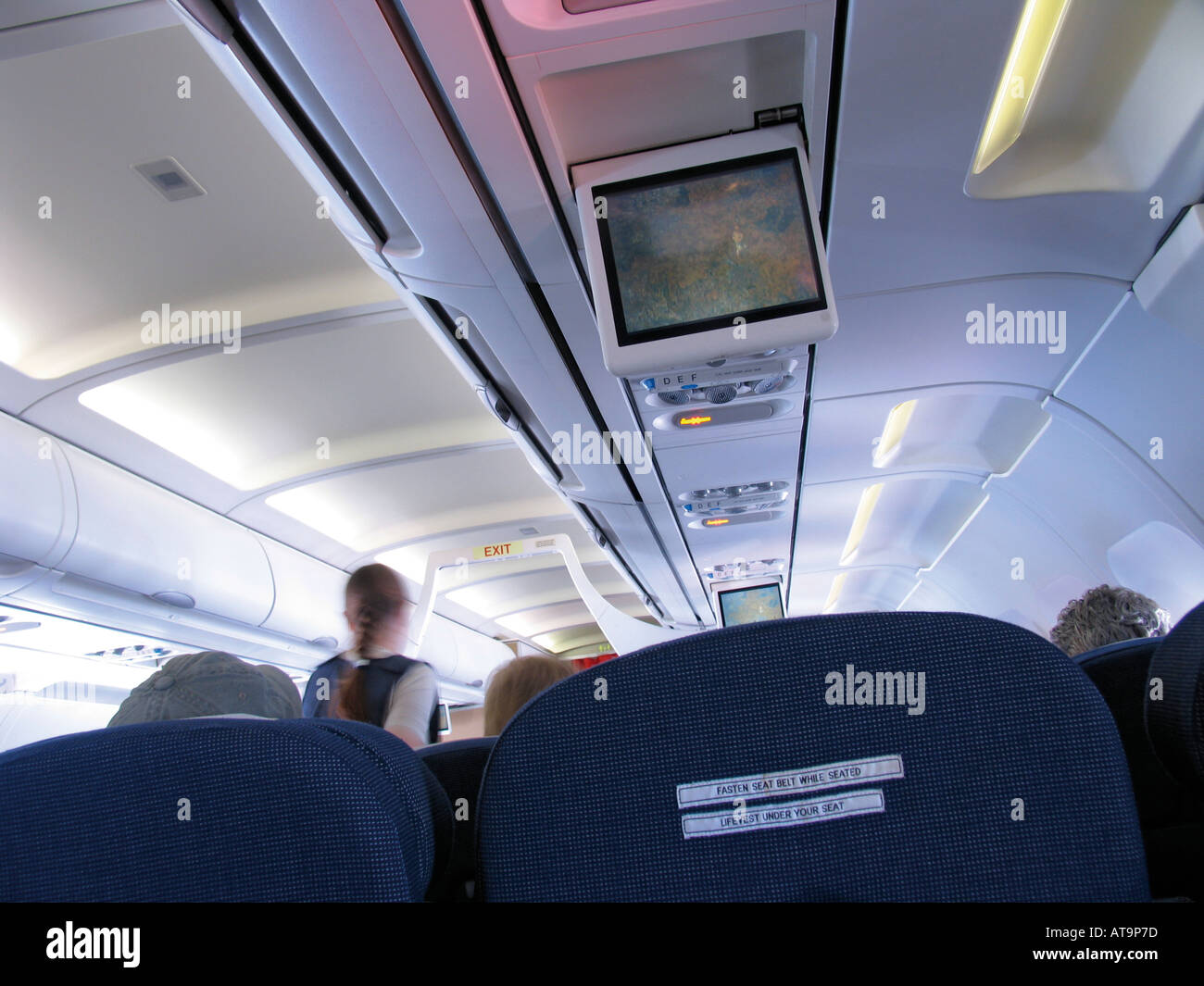 Interior of jet airliner during flight Stock Photo - Alamy