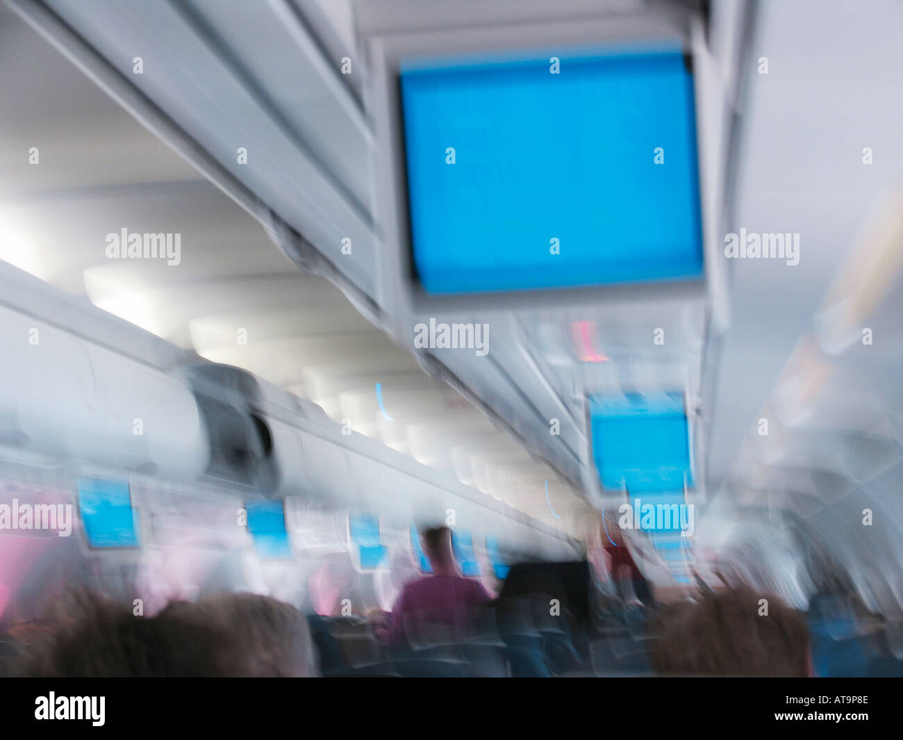Interior of jet airliner during flight Stock Photo - Alamy