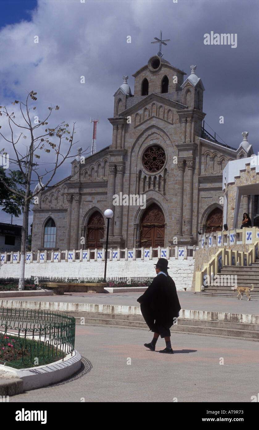 Indigenous man in typical clothes walking in front of the church in ...