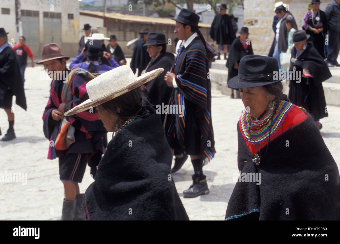 Indigenous people of Saraguro leaving the church after Sunday mass in ...