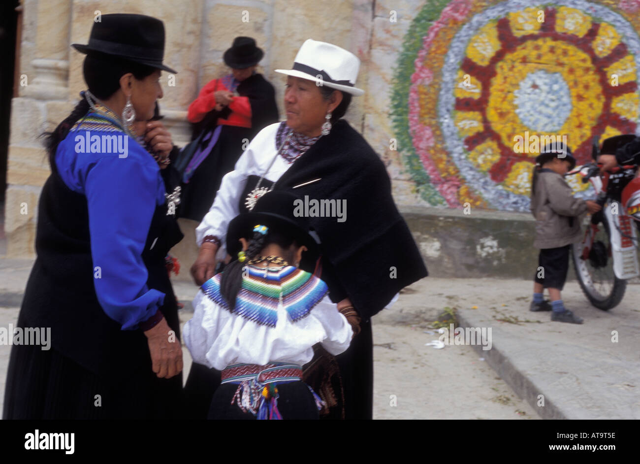 Indigenous woman in typical clothes talking in front of the church in ...