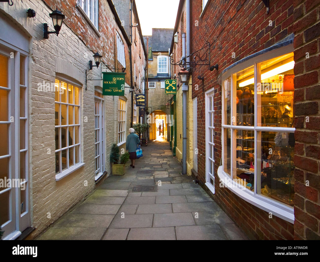 The Ginnel a narrow shopping lane in Devizes Wilts UK EU Stock Photo ...