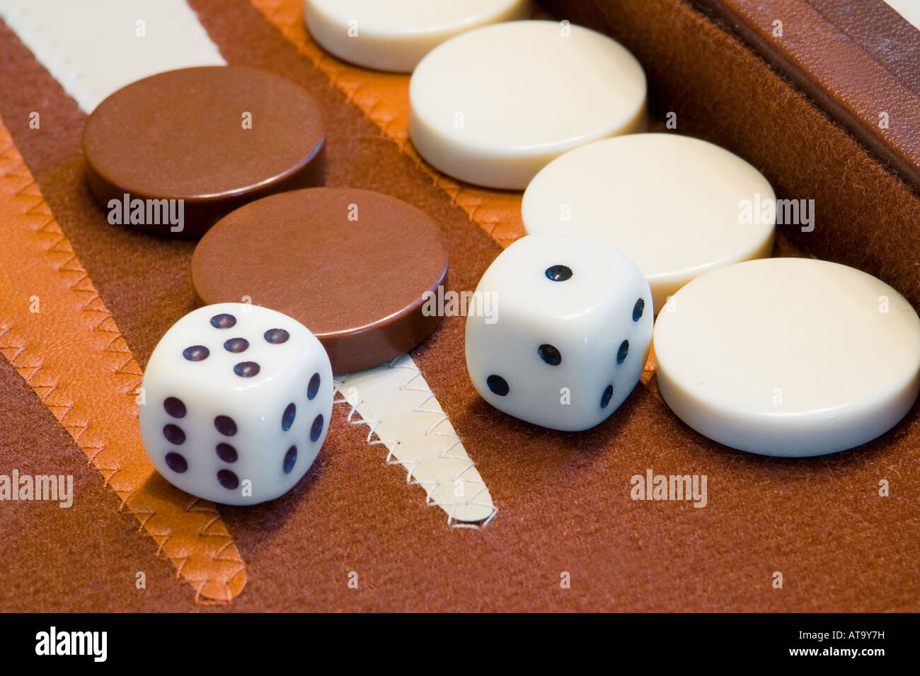 Brown backgammon dice pieces hi-res stock photography and images - Alamy