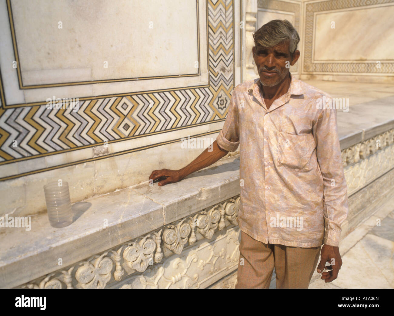 Man cleaning Taj Mahal marble taking a break, Agra, Rajasthan, India ...