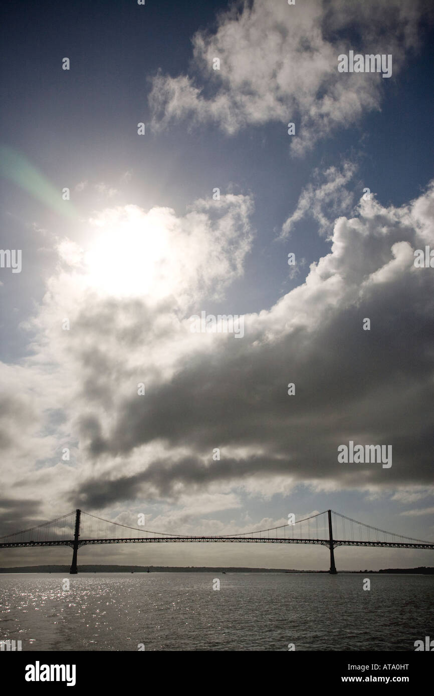 bridge over water, big sky, clouds, ocean, sun Stock Photo - Alamy