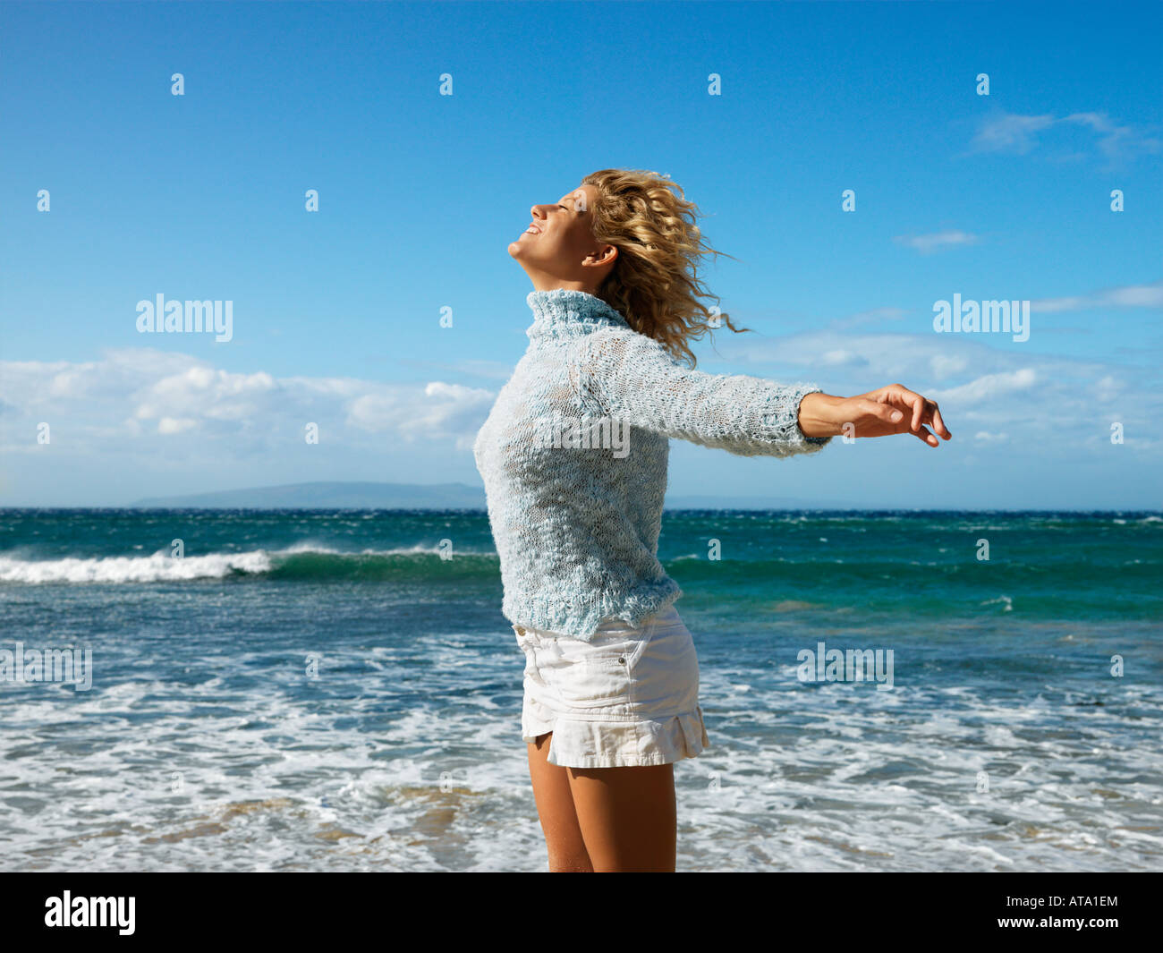 Hair Blowing In The Wind At Beach