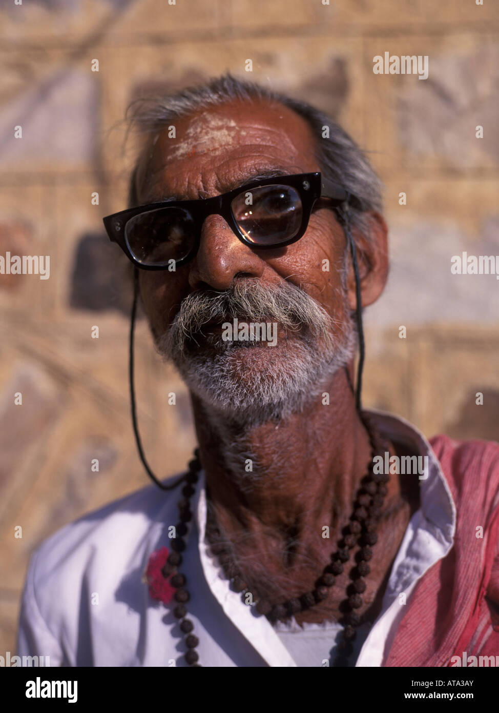 Portrait of bearded Indian man wearing glasses, Rajasthan, India Stock ...