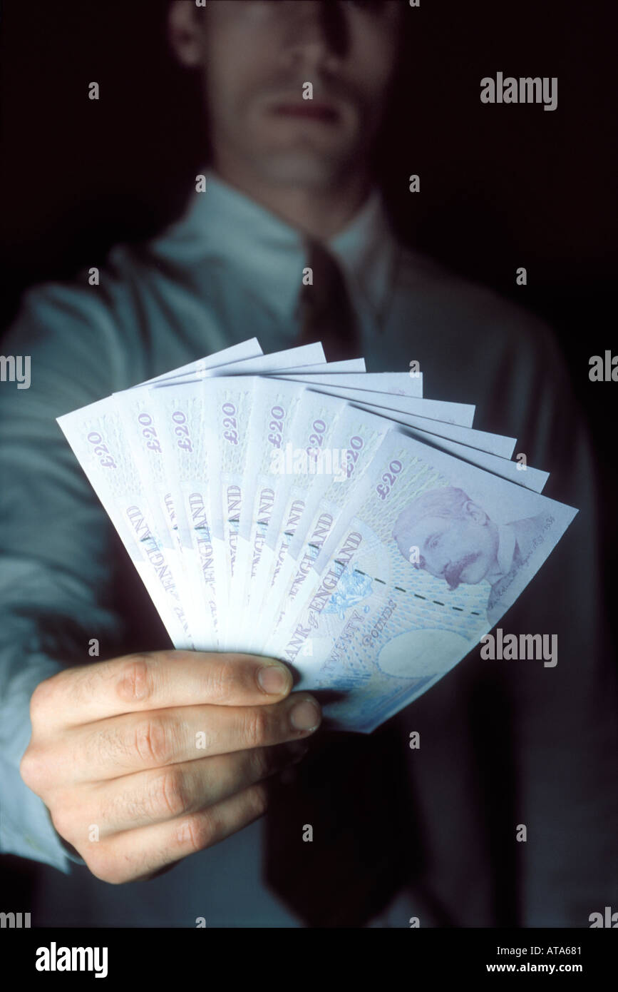 Man counting pound notes hi-res stock photography and images - Alamy