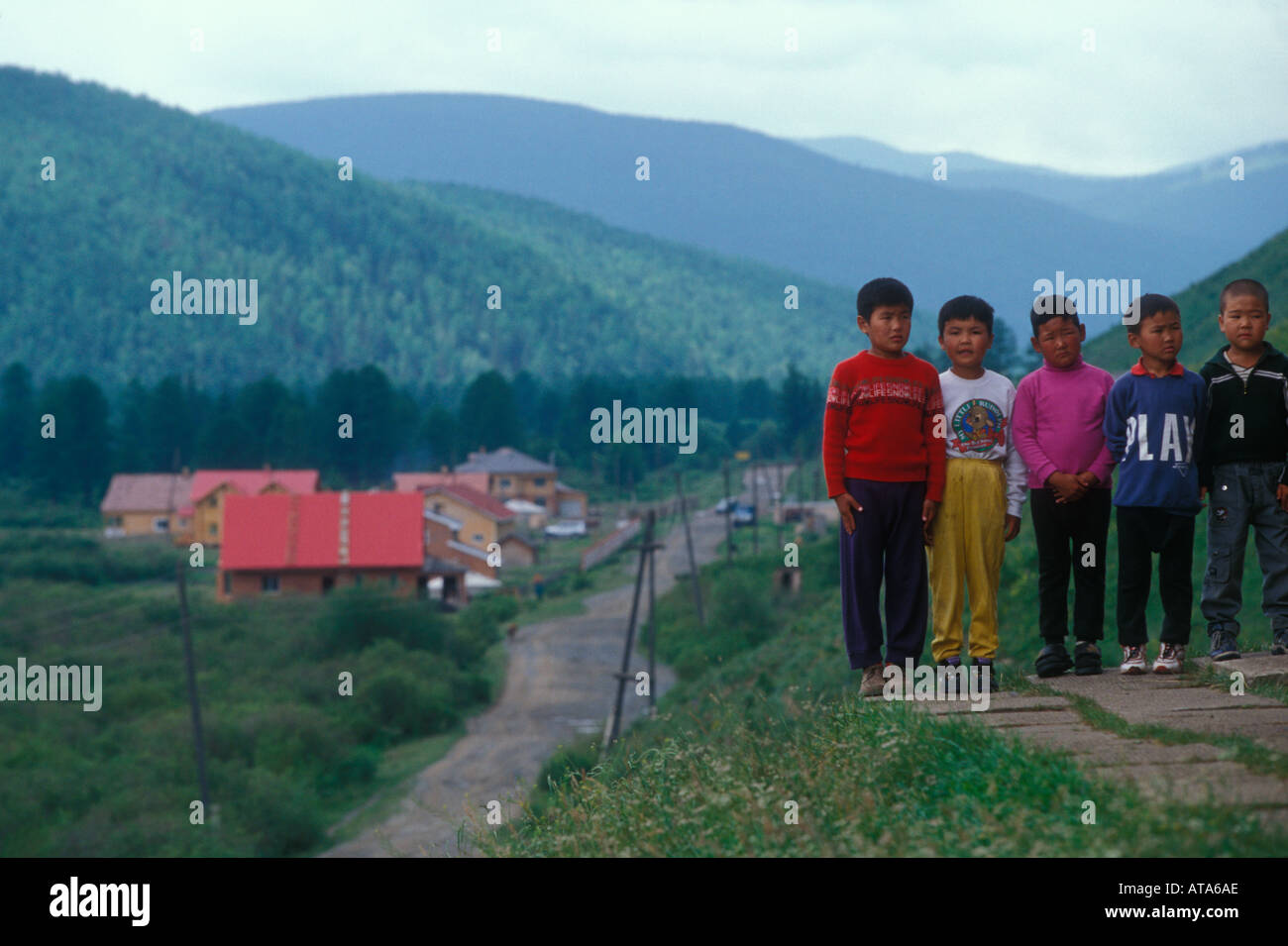 Orphaned Mongolian children stand in a line outside Ulan Bator Mongolia ...