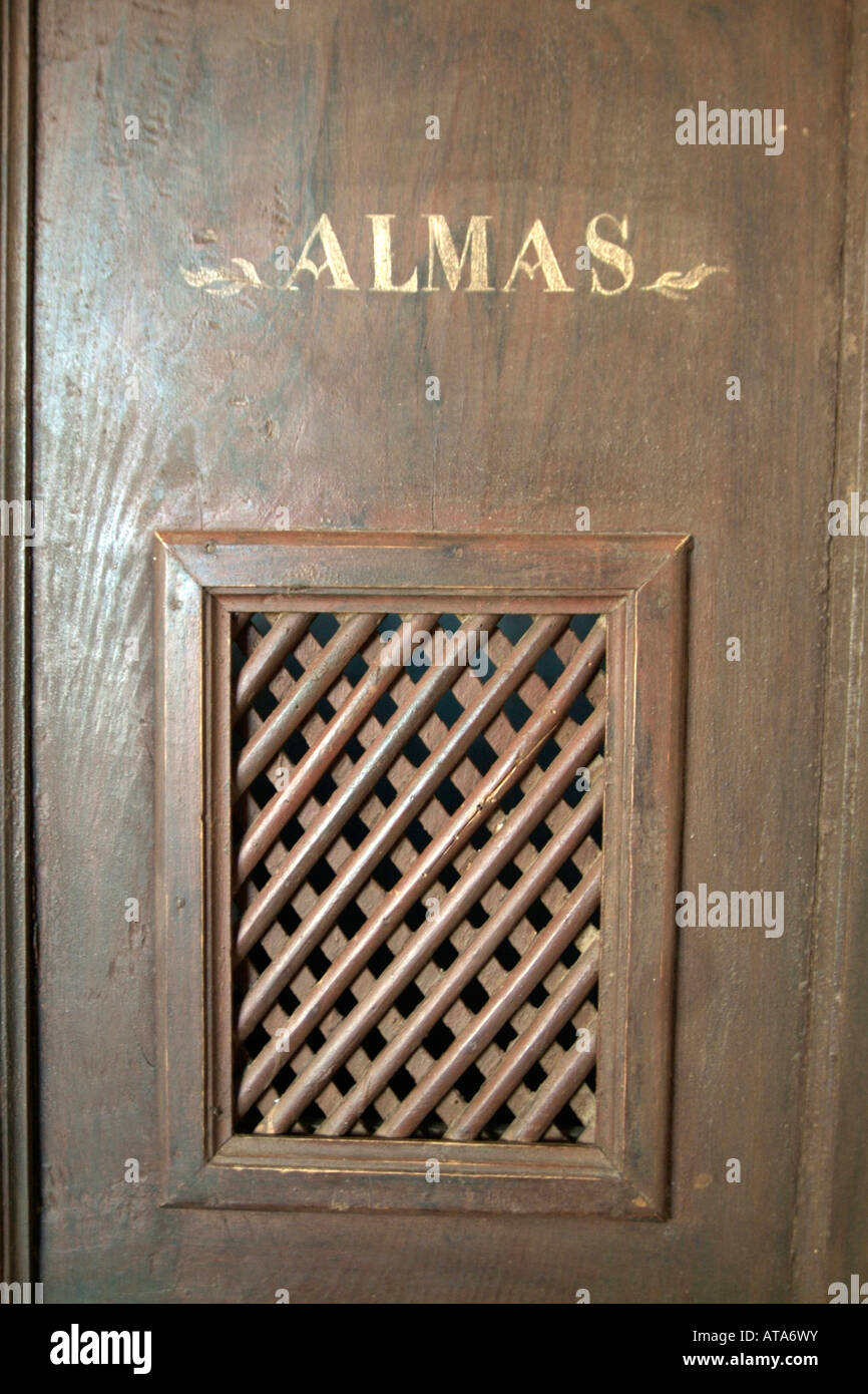 screen in a church confessional box in Portugal (Almas is souls in ...