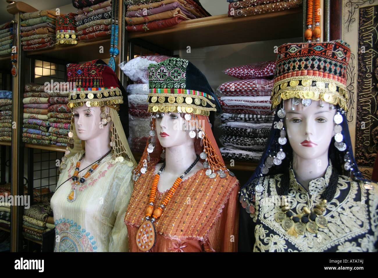 Amman has many shopping venues A shop of traditional clothes offers a ...