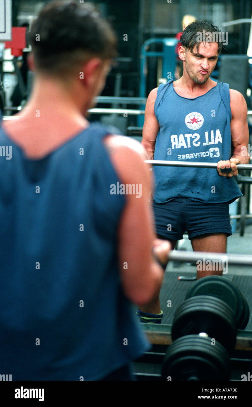 Working out at the gym Stock Photo - Alamy