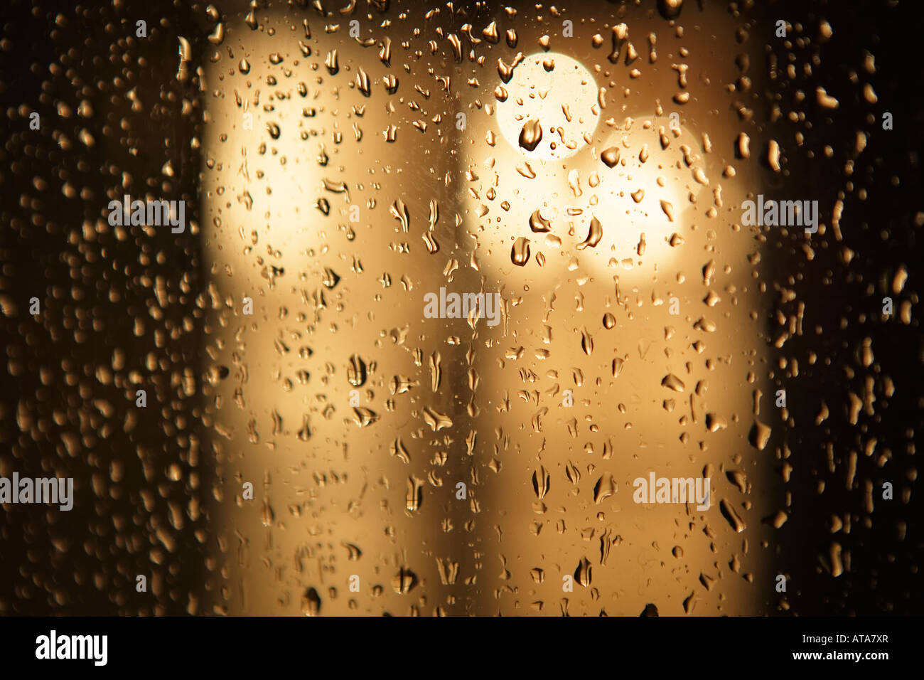 light glow through a wet window Stock Photo - Alamy