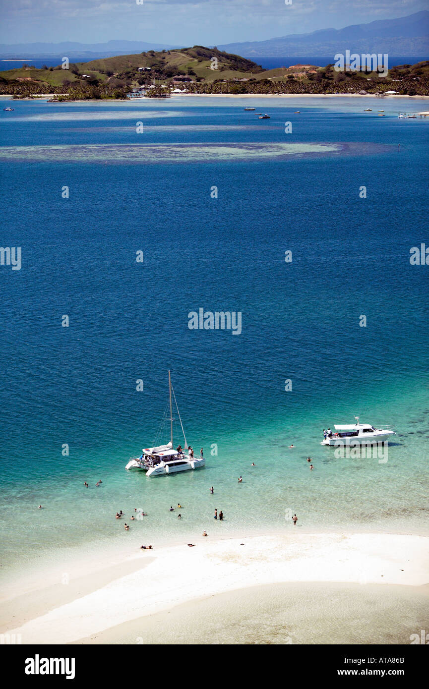 Day trip boats from Sonaisali Island Resort Fiji Stock Photo - Alamy