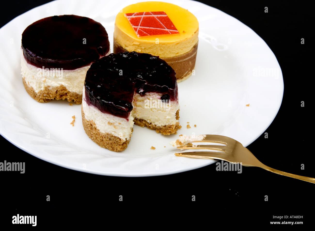 three small fancy cakes Stock Photo - Alamy