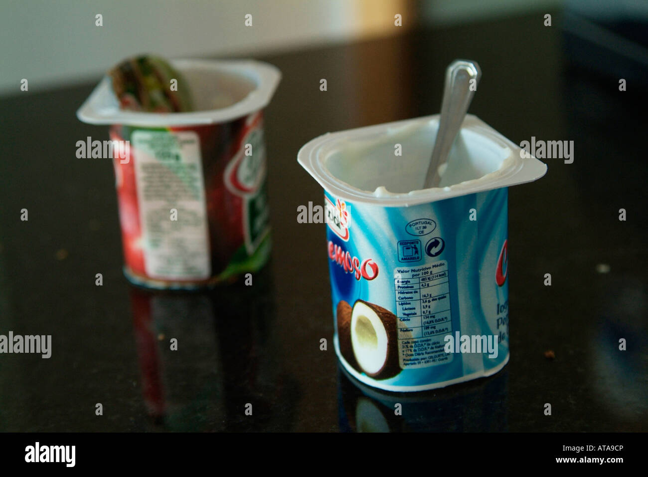two empty yoghurt cups Stock Photo - Alamy
