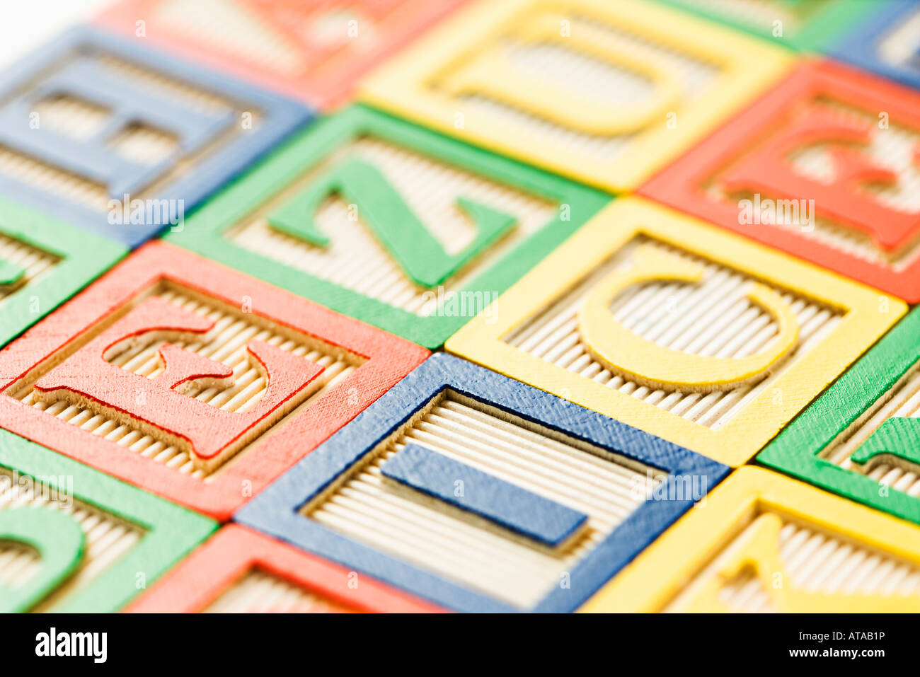Alphabet building block toys arranged together Stock Photo - Alamy