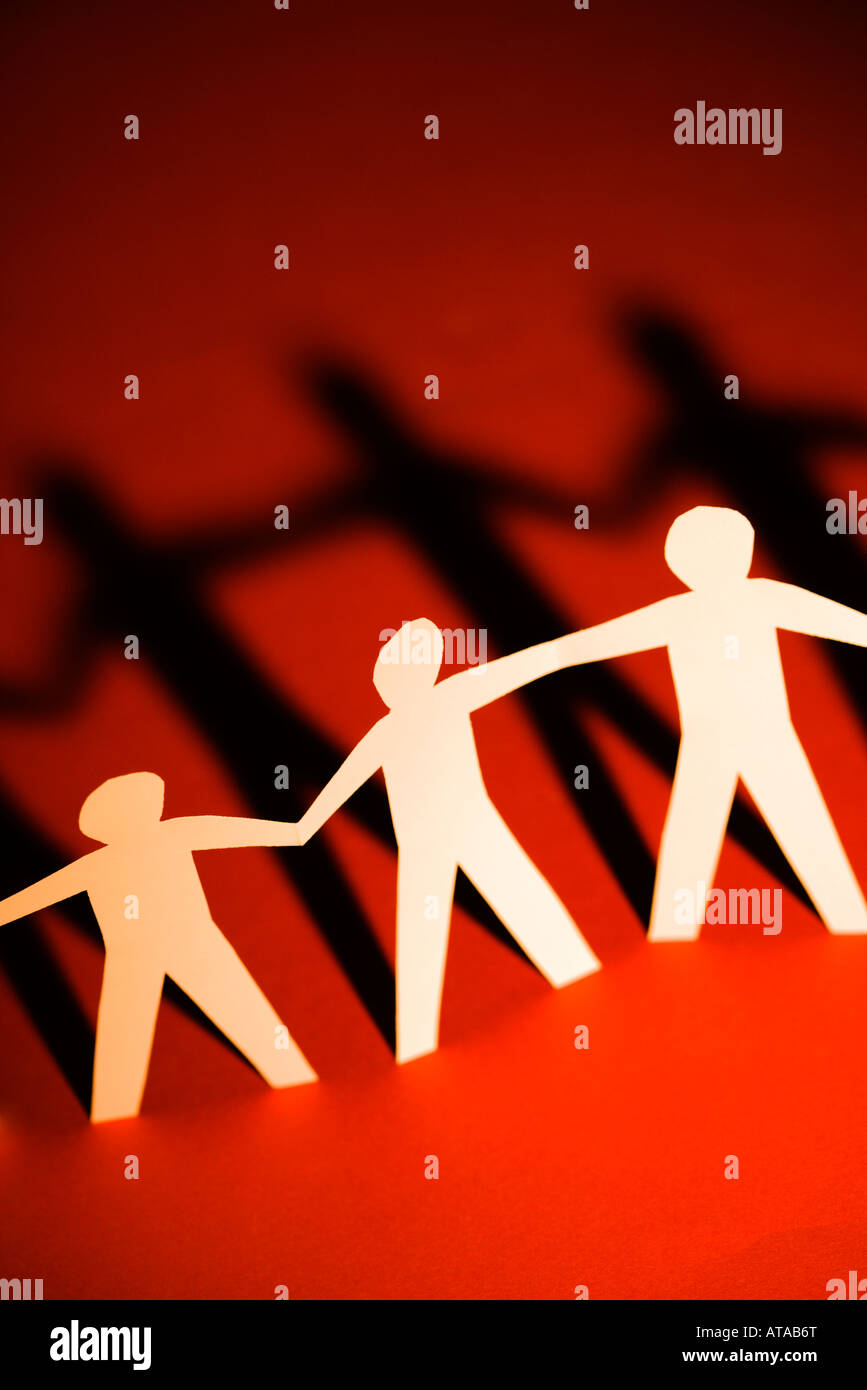 Hands Holding Paper Cutout Stock Photos & Hands Holding Paper Cutout ...